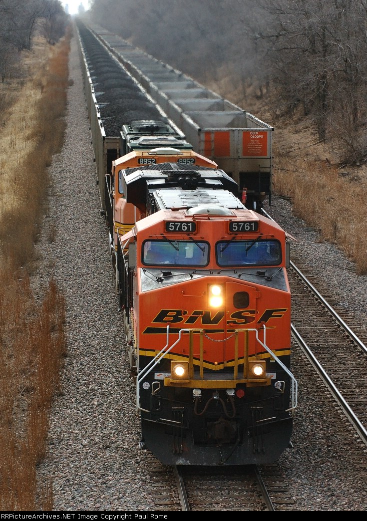 BNSF 5761, ES44AC, leads an EMD MAC with eastbound coal loads